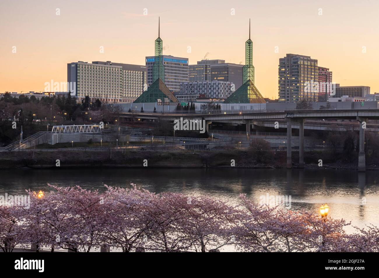 Portland, Oregon. Cherry trees in bloom on the Willamette River in ...