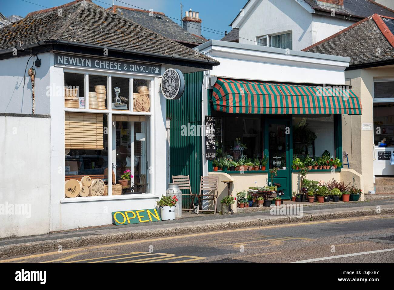 Newlyn, Cornwall, England, UK. 2021. Cheese and florist shops in the ...