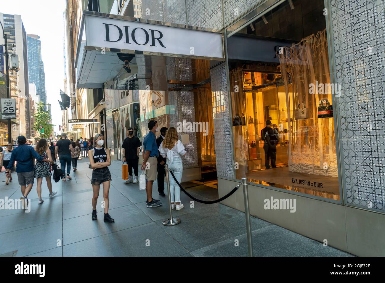 Line to enter the Dior store in Midtown Manhattan in New York on ...