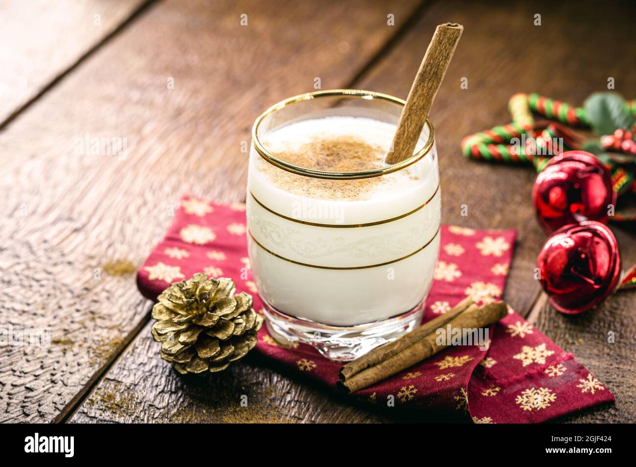 winter drink made with eggs, liqueur and cinnamon, called eggnog ...