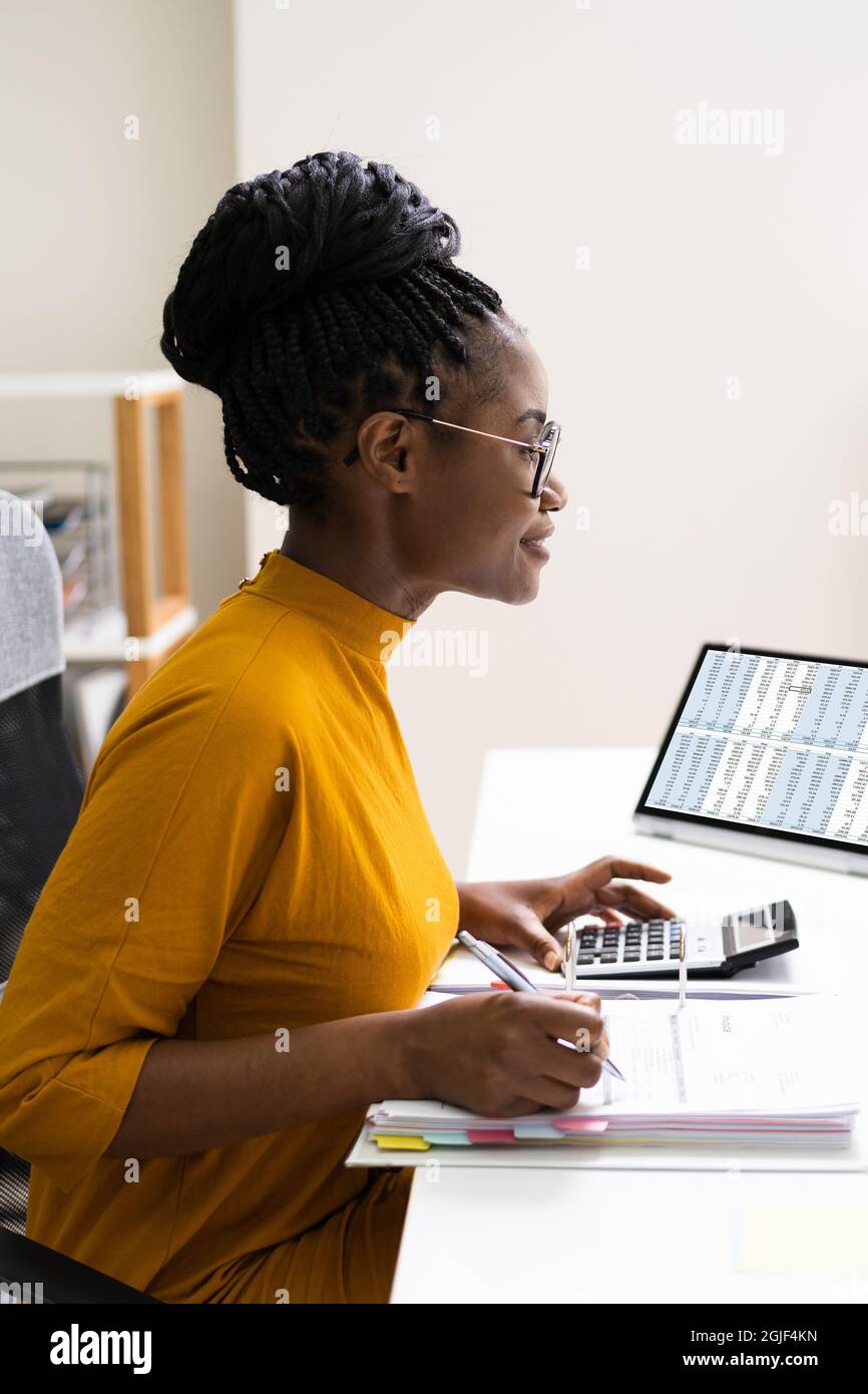 Accountant Lady In Office Using Calculator For Customs Accounting Stock ...