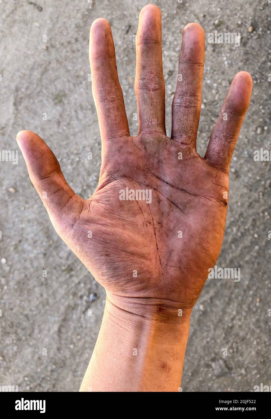 Dirty palm of Southeast Asian worker man's right hand. Skin creases are ...