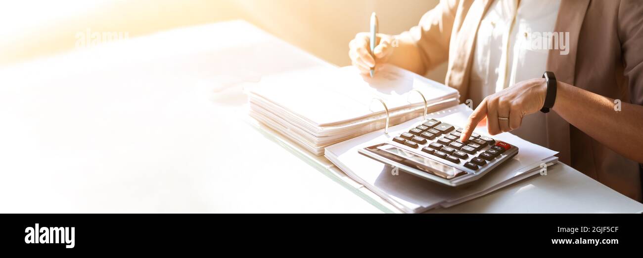 Accountant Lady In Office Using Calculator For Customs Accounting Stock ...