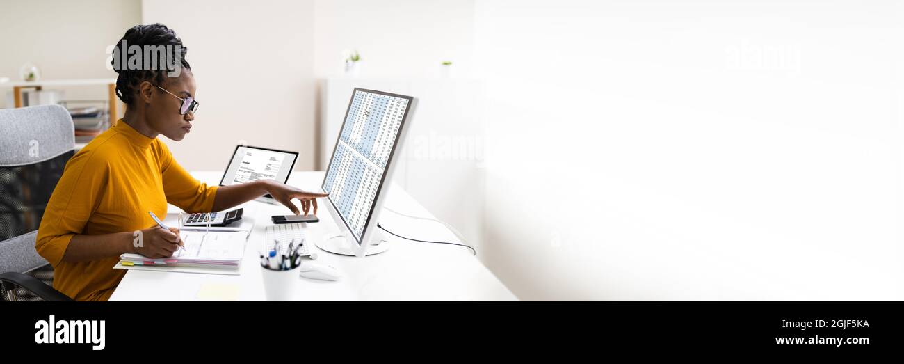 Analyst Employee Working With Spreadsheet On Computer Stock Photo - Alamy