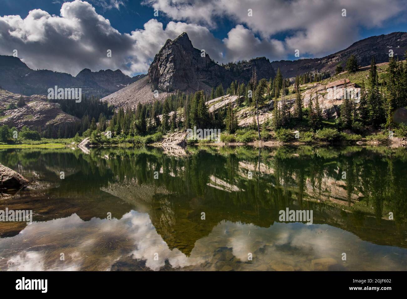 Sundial Peak reflected in Lake Blanche is an icon of Wasatch Mountains ...