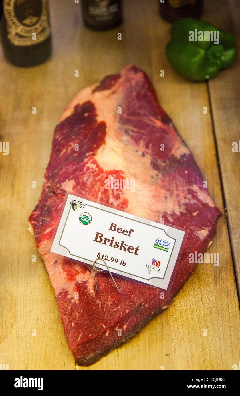 Local butcher shop with raw meat in display case in Middleburg, town in ...