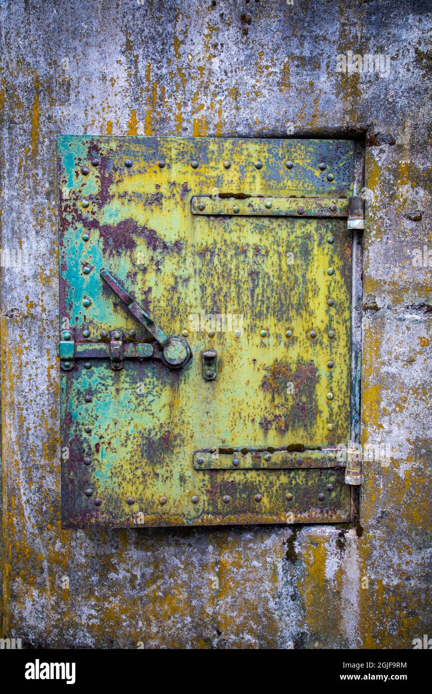 USA, Washington State, Port Townsend. Rusted metal door in fort. Credit ...