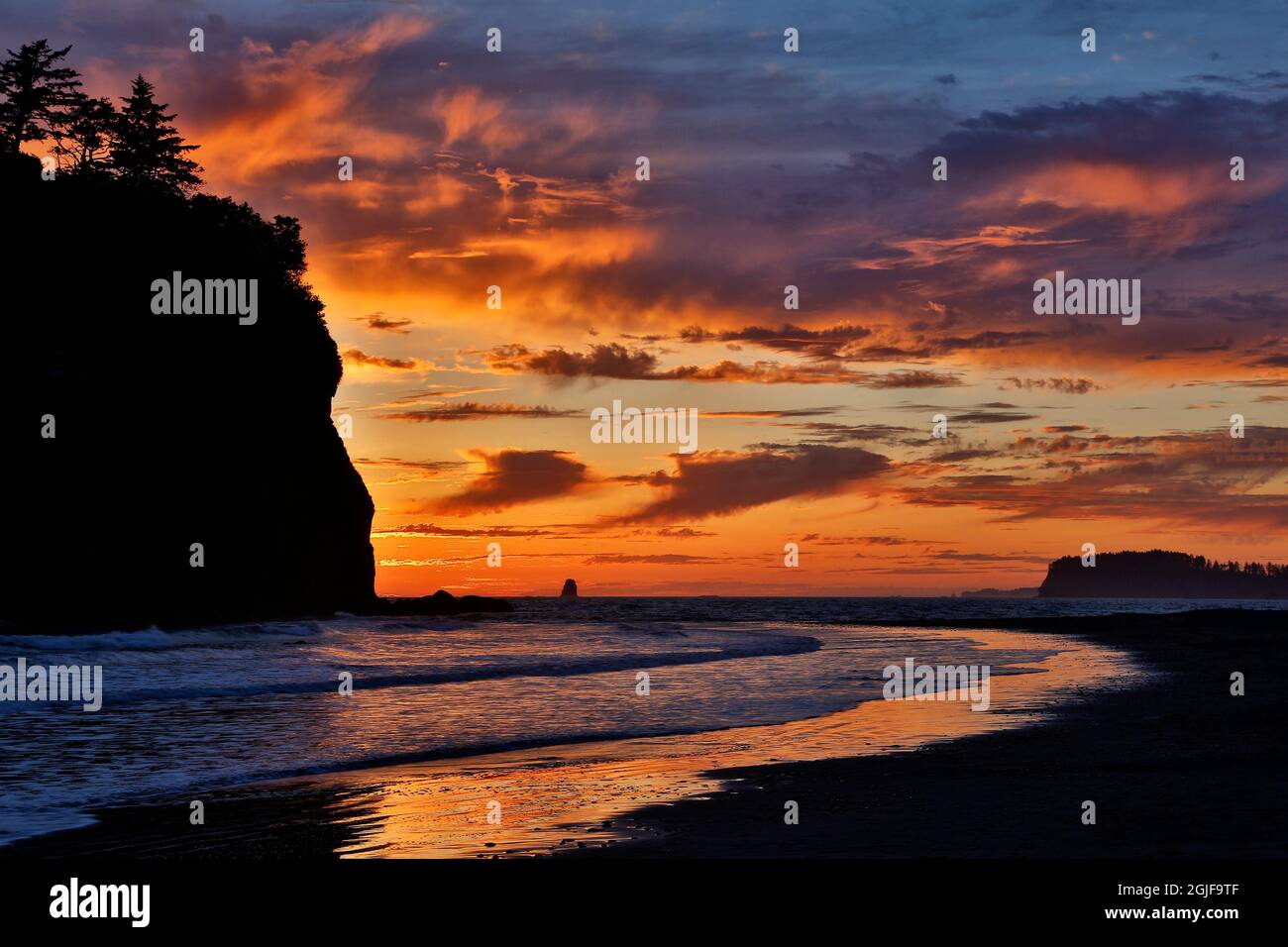 USA, Washington State, Olympic National Park. Sunset at Ruby Beach ...