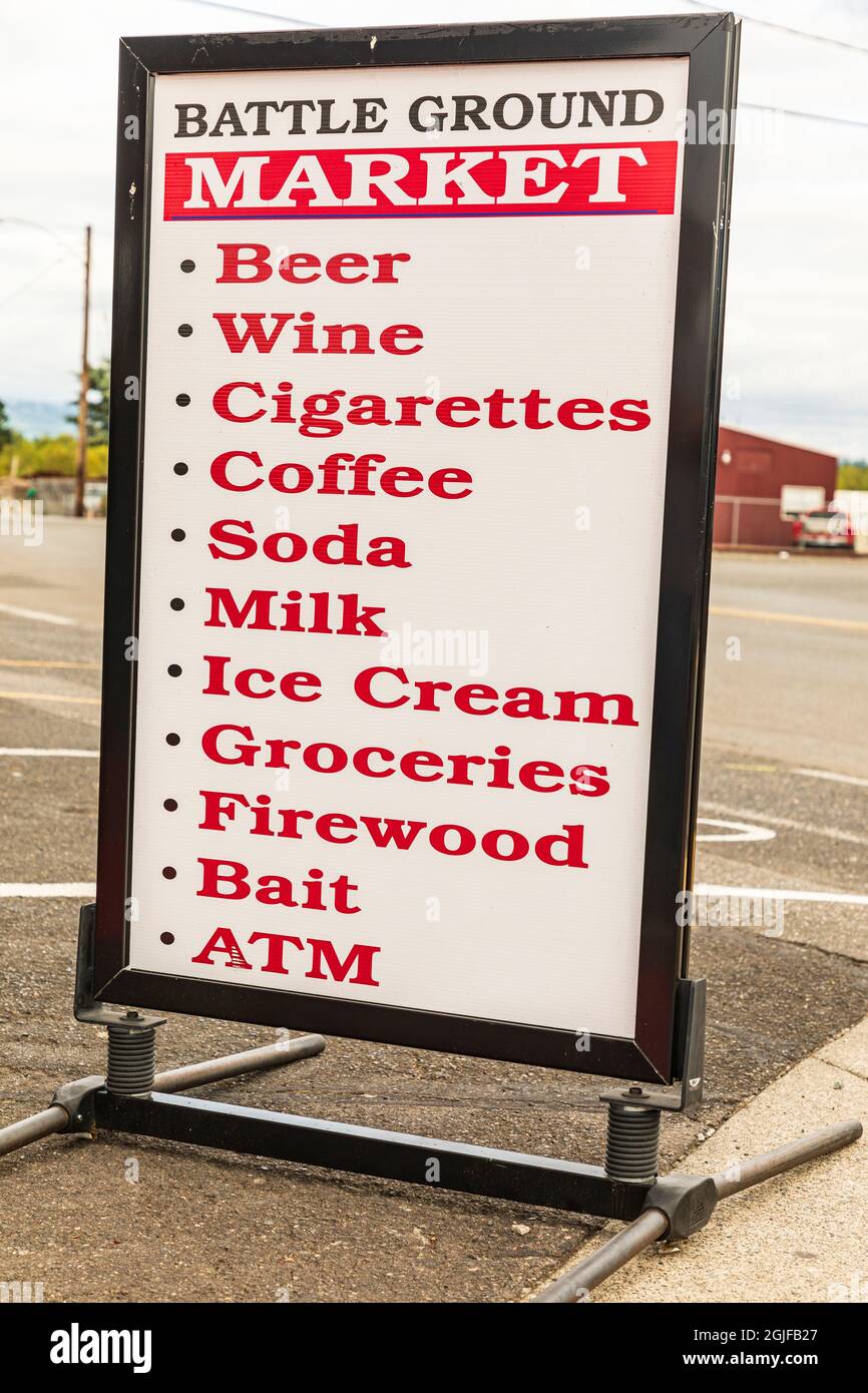 USA, Washington State, Battleground. Sign outside of small market ...
