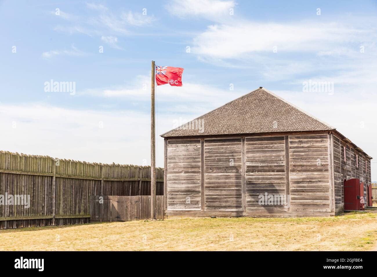 USA, Washington State, Fort Vancouver National Historic Site. Flag over ...