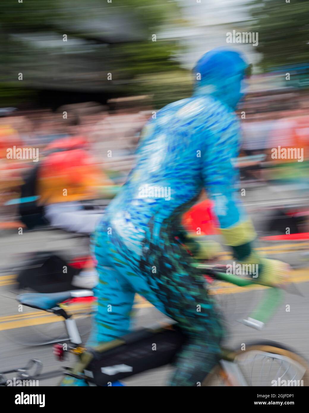 Usa, Washington State, Seattle, Fremont. A bicyclist in blue body paint ...