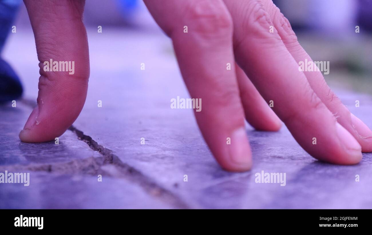 Fingers touching floor hi-res stock photography and images - Alamy