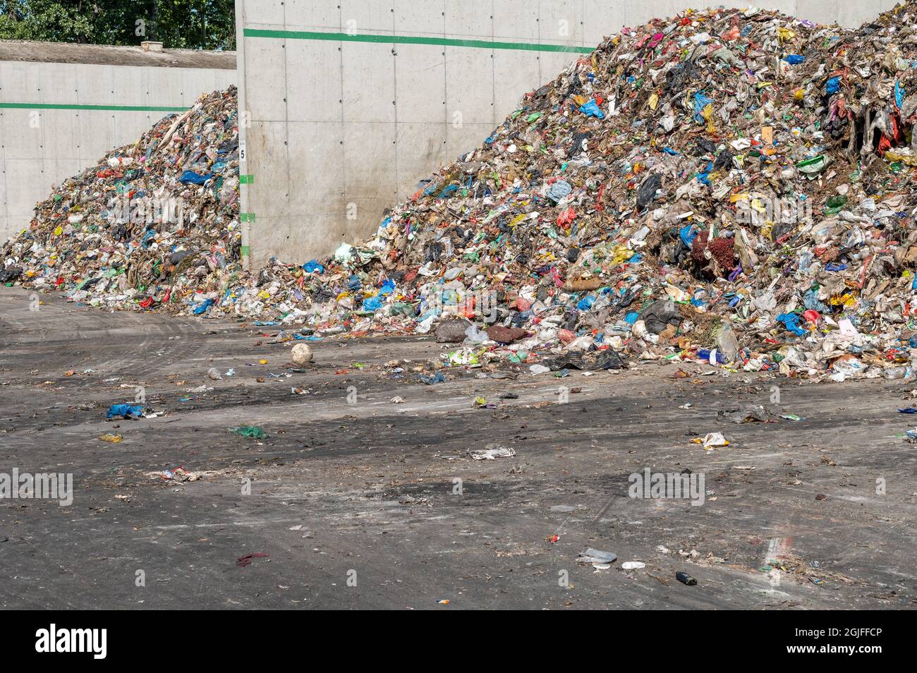 Waste treatment facility with piles of municipal waste Stock Photo - Alamy