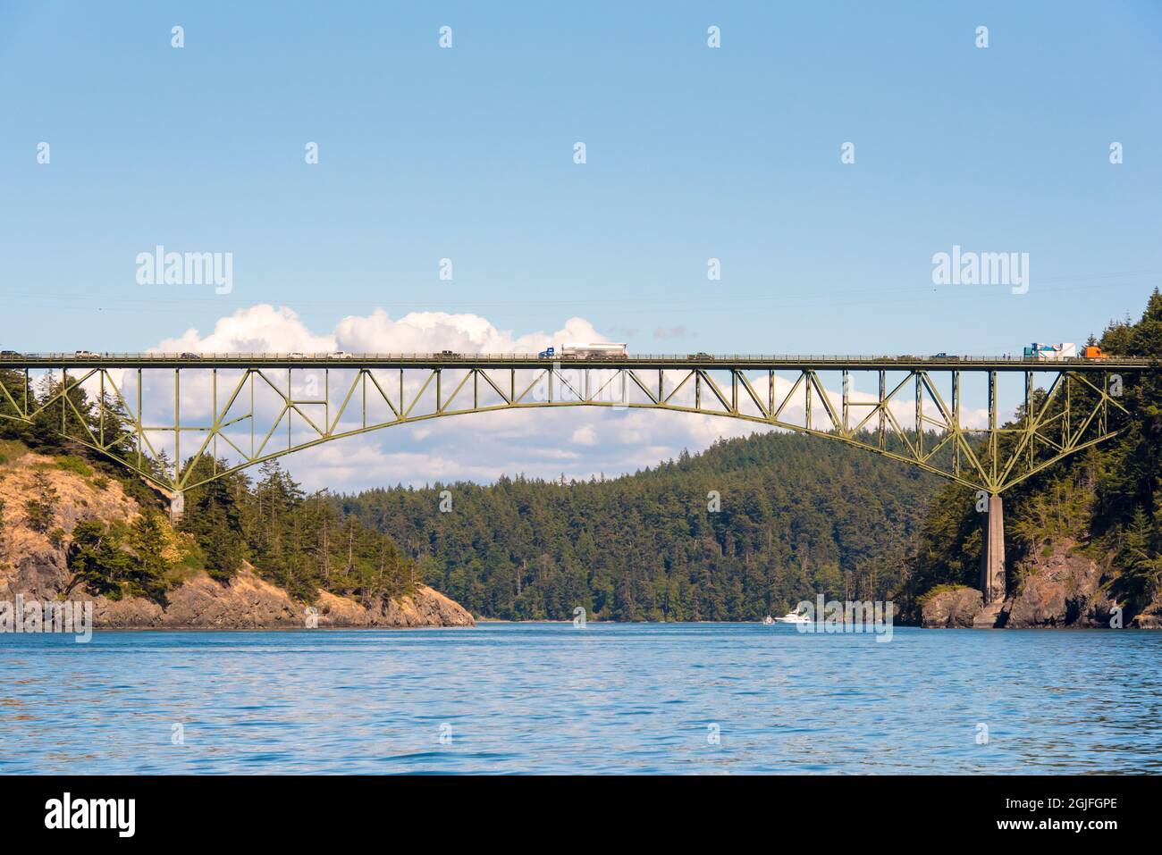 USA, Washington State. Deception Pass Bridge joins Whidbey Island Canoe ...