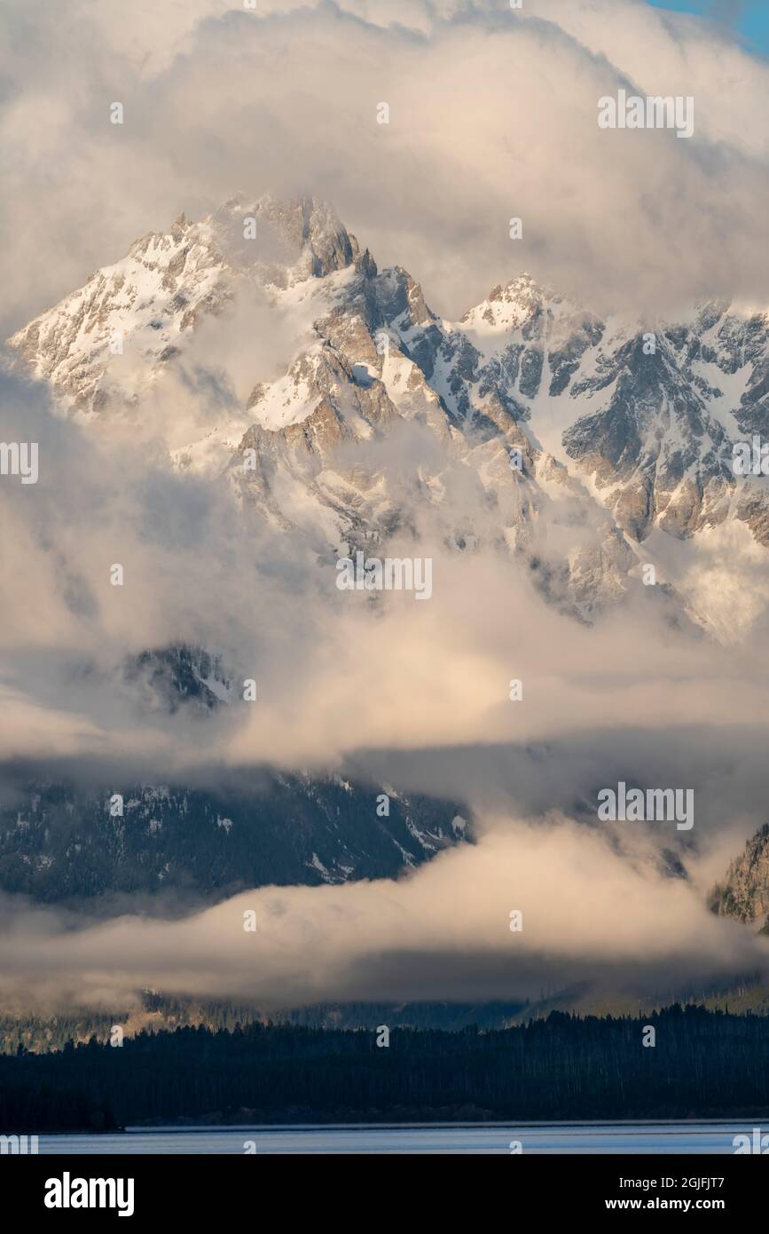 USA, Wyoming, Grand Teton National Park. A spring storm sends clouds ...