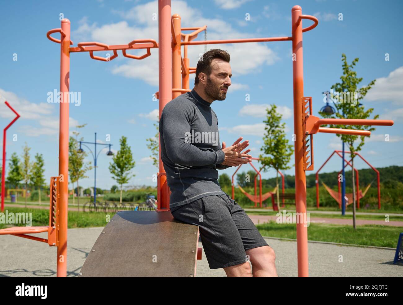 Confident portrait of handsome macho, attractive sporty man, European ...