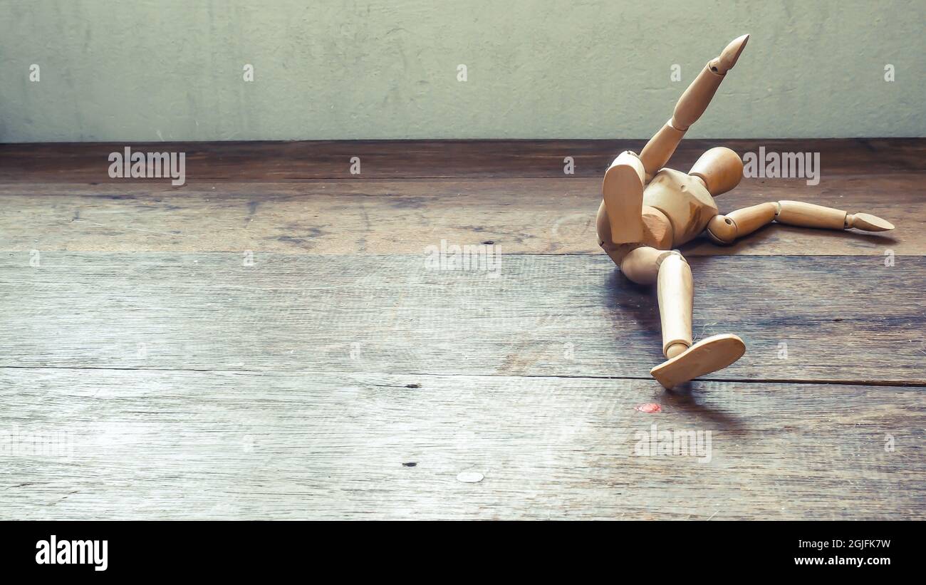 Wooden mannequin falling down. Fall concept.business.life.failure idea ...