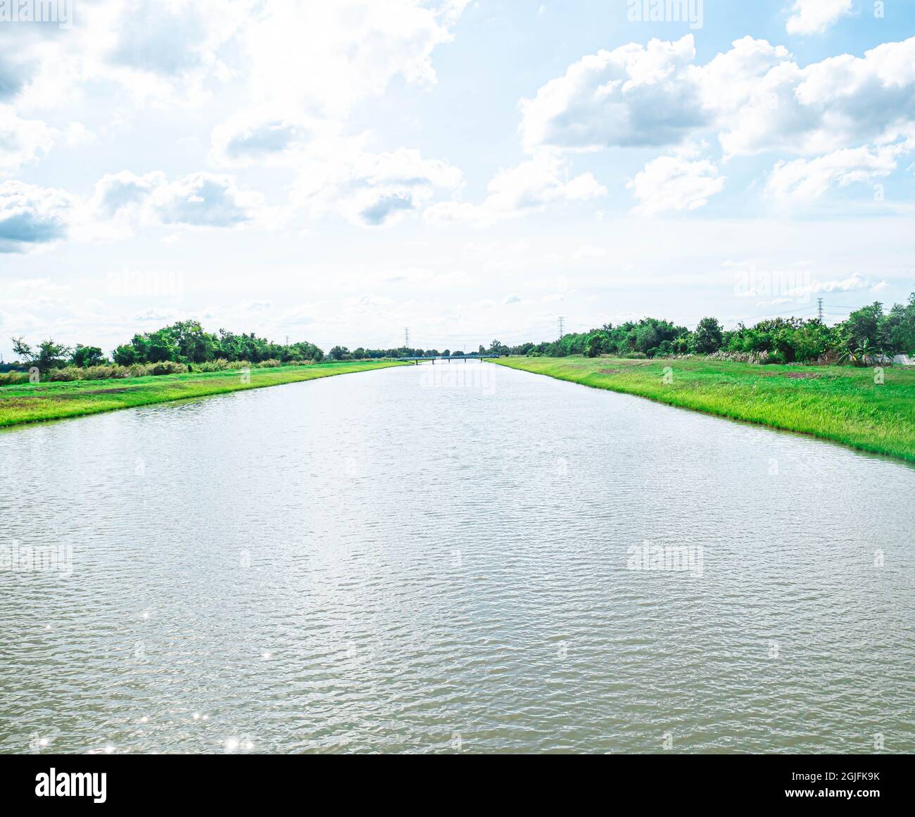 Water conveyance and distribution canals .An irrigation canal with a ...