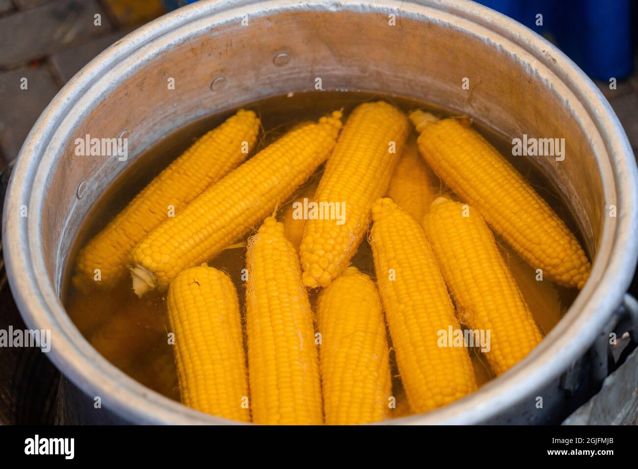 Boiled corn. Cooking corn process in Turkish market, healthy street ...