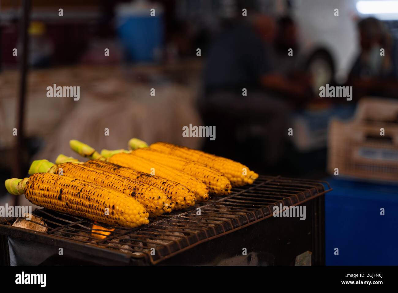 Fried corn on the grill on street. Healthy street food in Turkish ...