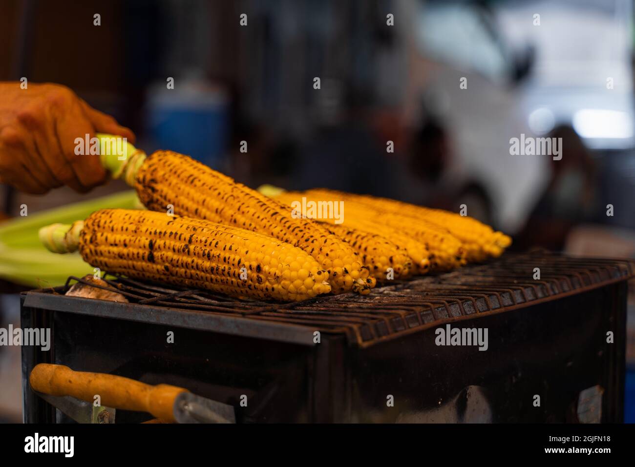 Fried corn on the grill on street. Healthy street food in Turkish ...
