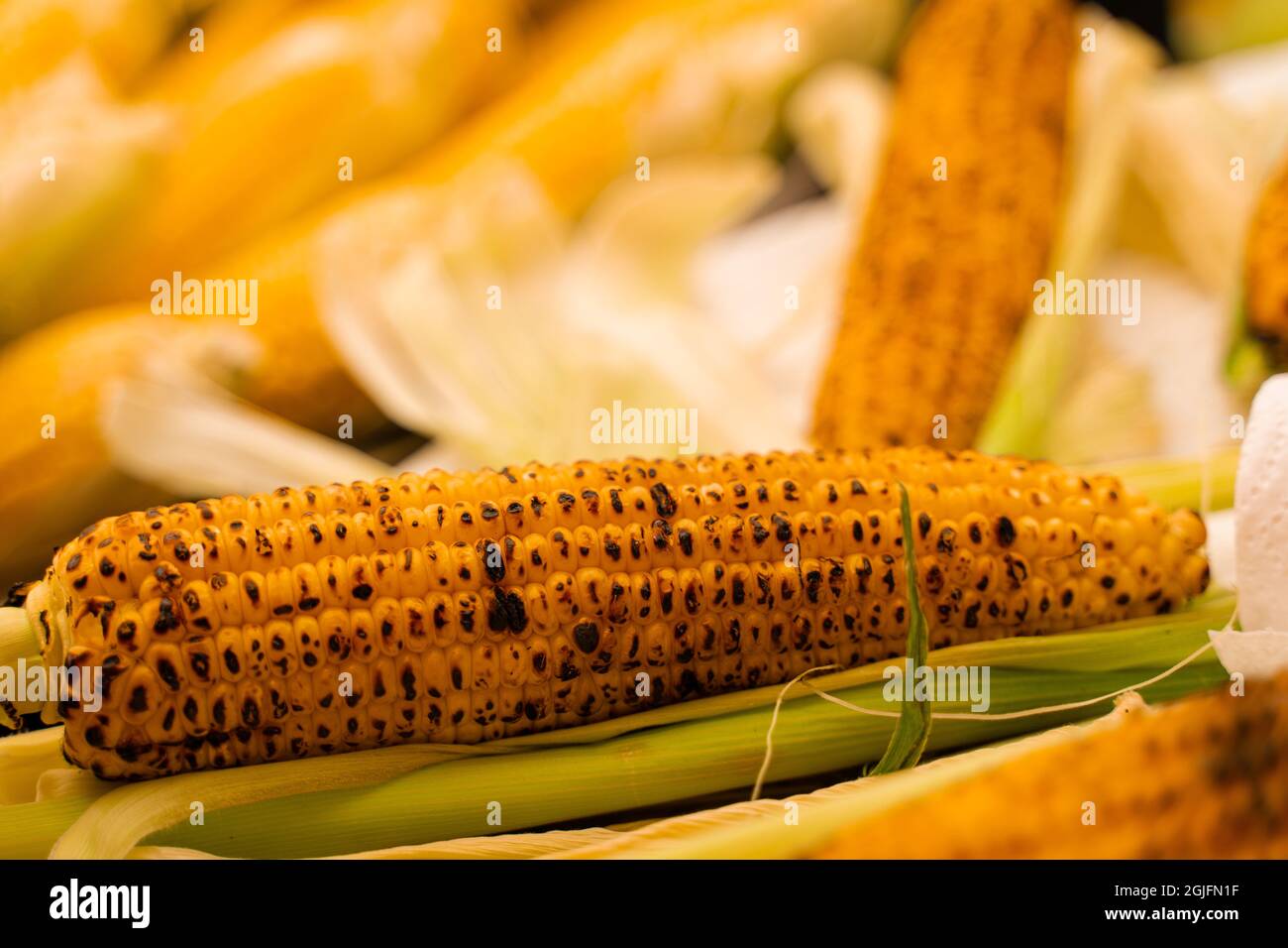 Fried corn on the grill on street. Healthy street food in Turkish ...