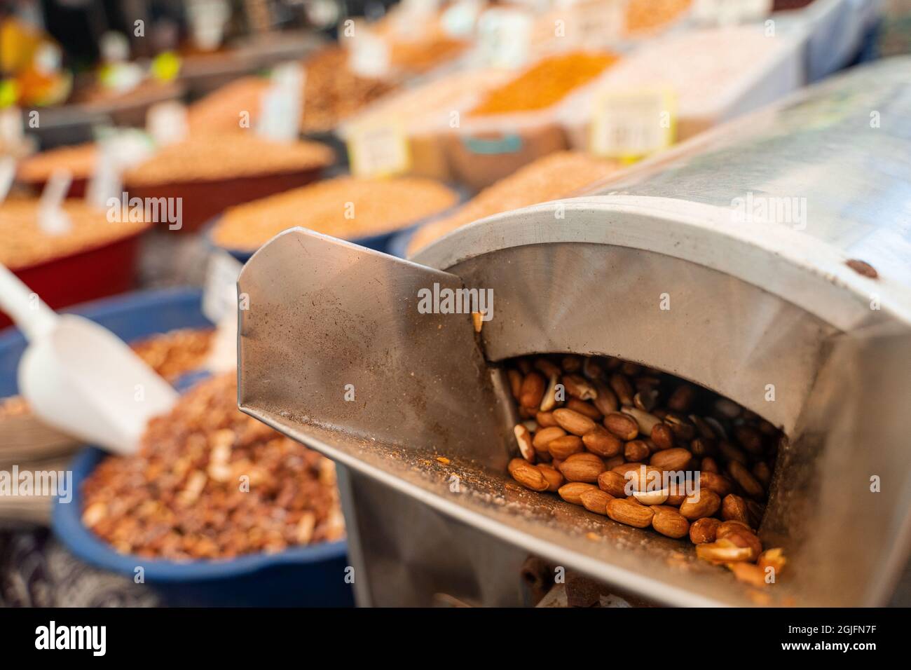 Roasting and blanching peanuts. Process of peeling peanuts in machine ...