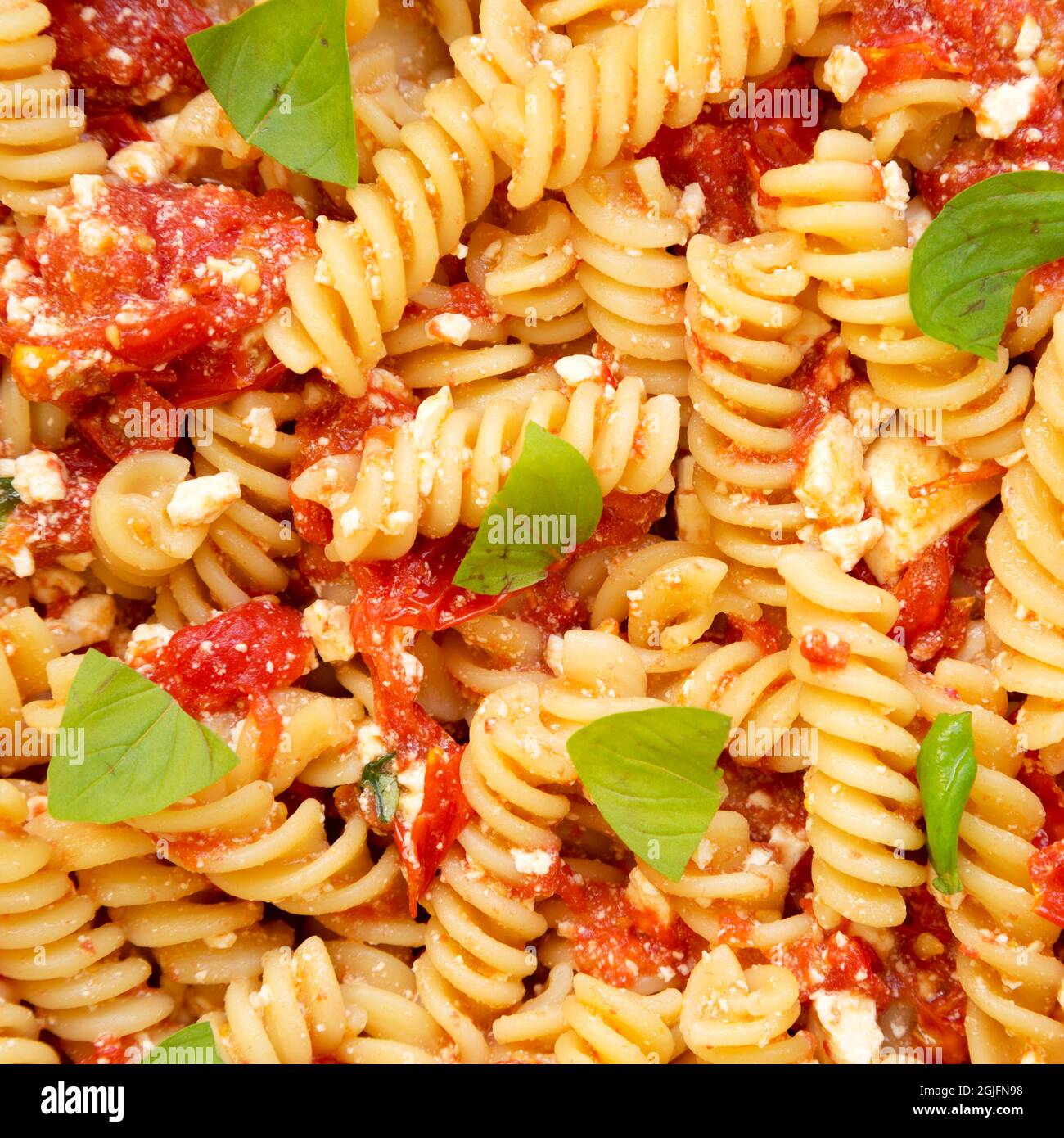 Homemade Baked Feta Tomato Pasta, overhead view. Flat lay, top view ...
