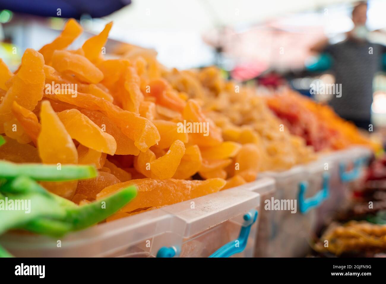 Dried melon on background of market. Dried candied fruits sold in ...