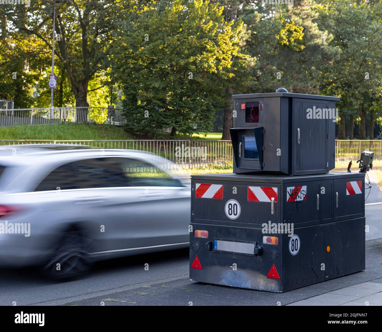 Mobile speed camera standing on street curve in Cologne and waiting for ...