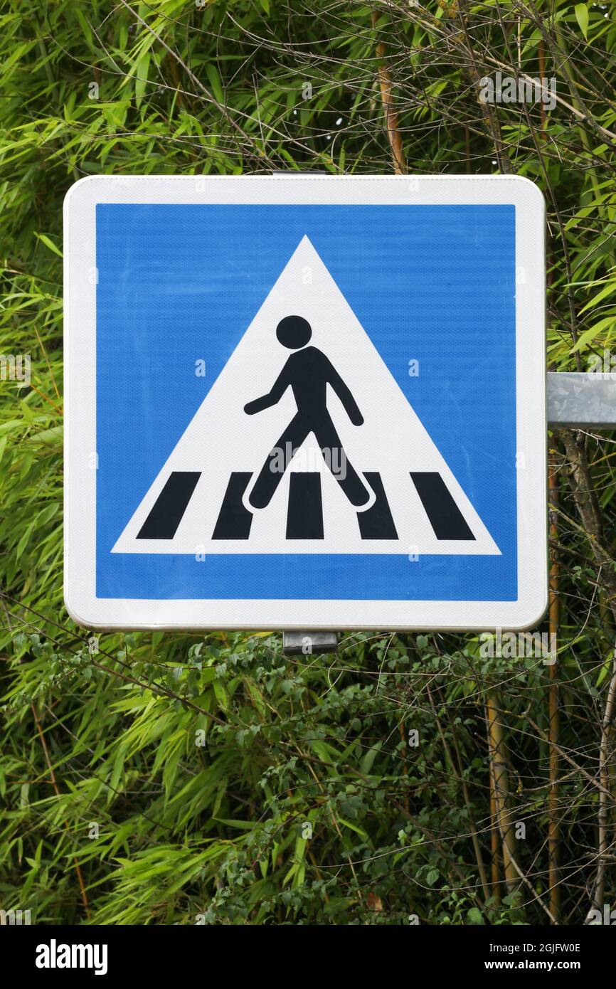 Pedestrian crosswalk road sign in France Stock Photo - Alamy
