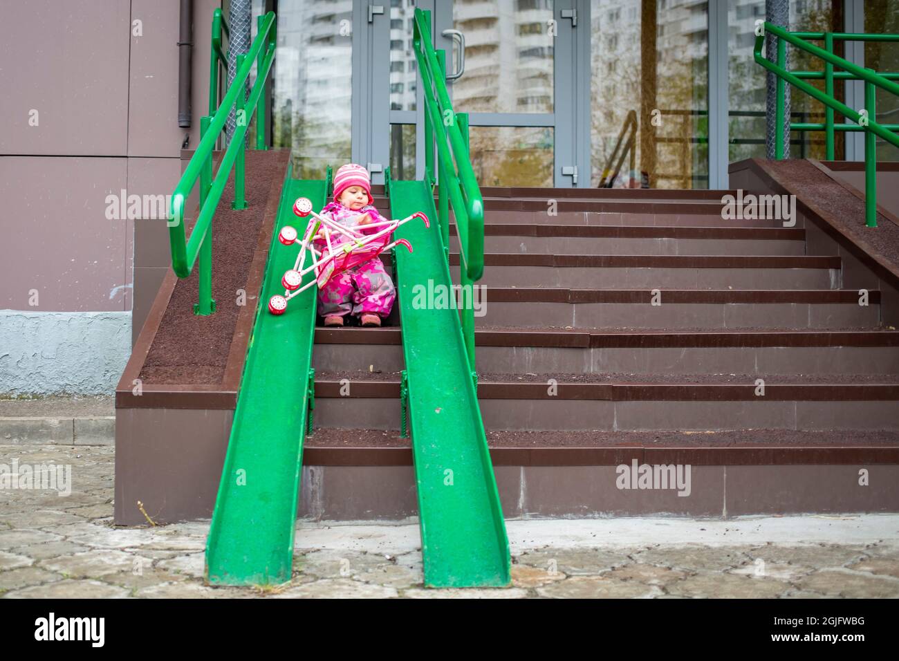 Pushing wheel chair ramp hi-res stock photography and images - Alamy