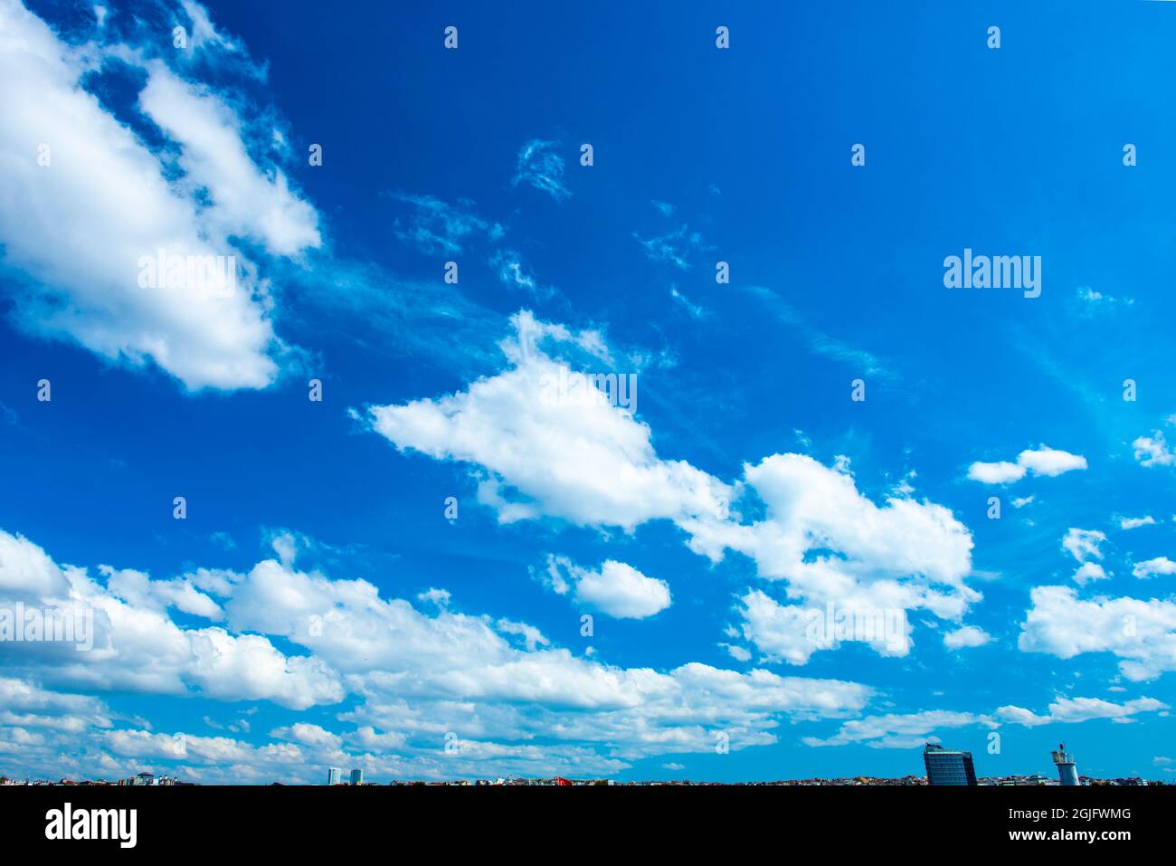 Blue sky with beautiful clouds. Blue sky background Stock Photo - Alamy