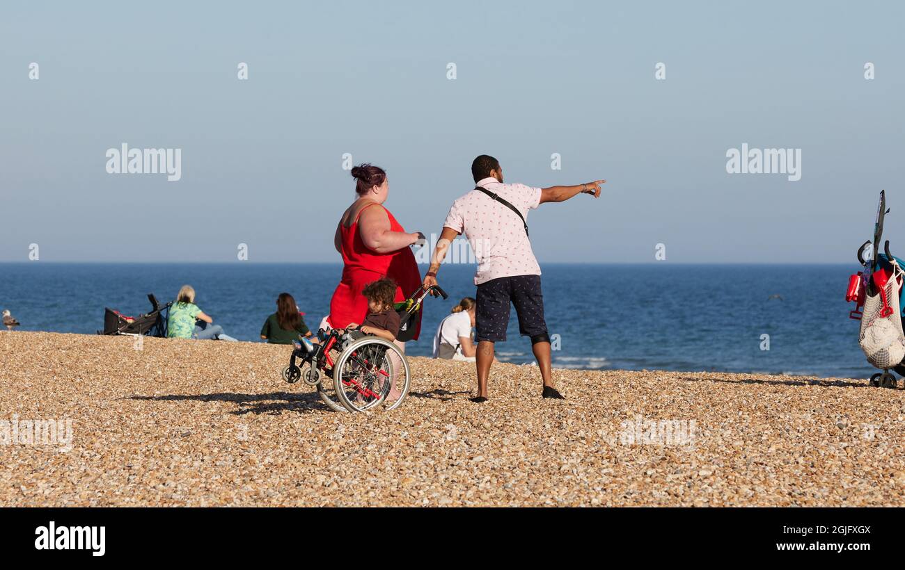 Family outing on the beach in the UK during the summer of 2021 Stock ...