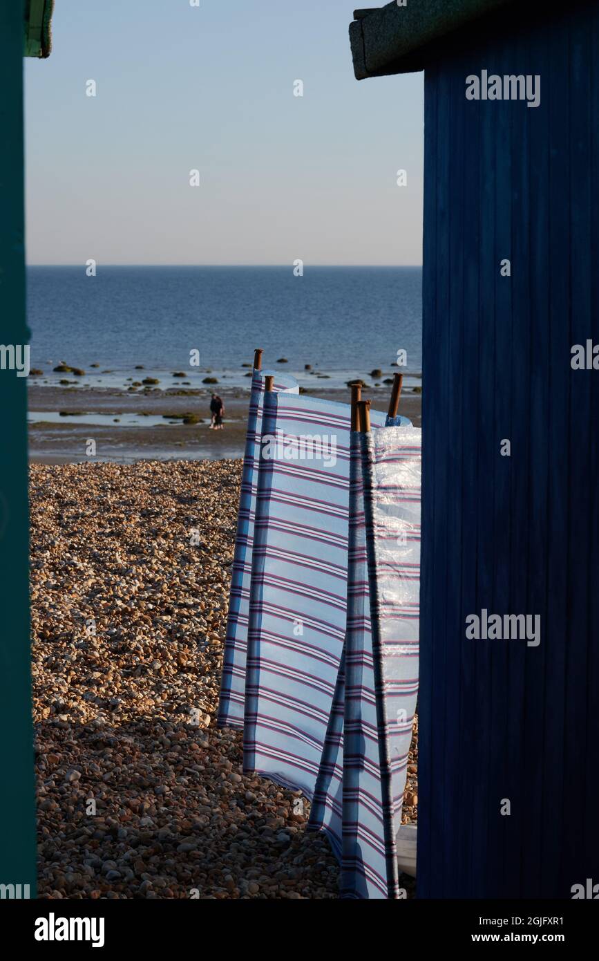 Blue coloured windscreen seen on the beach in the UK Stock Photo - Alamy