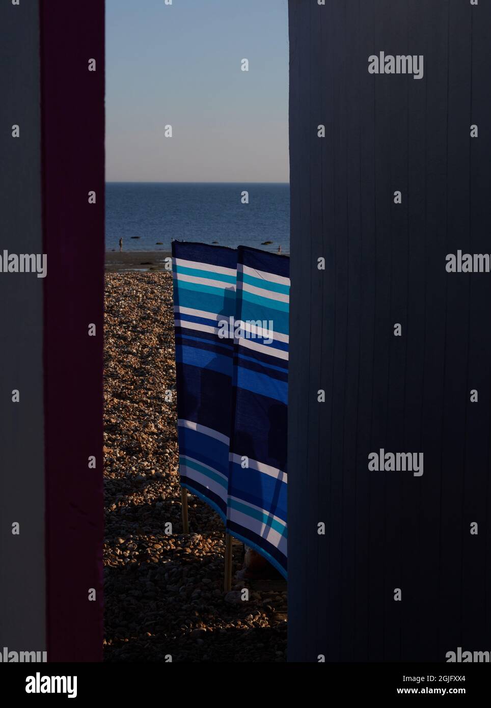 Blue coloured windscreen seen on the beach in the UK Stock Photo - Alamy