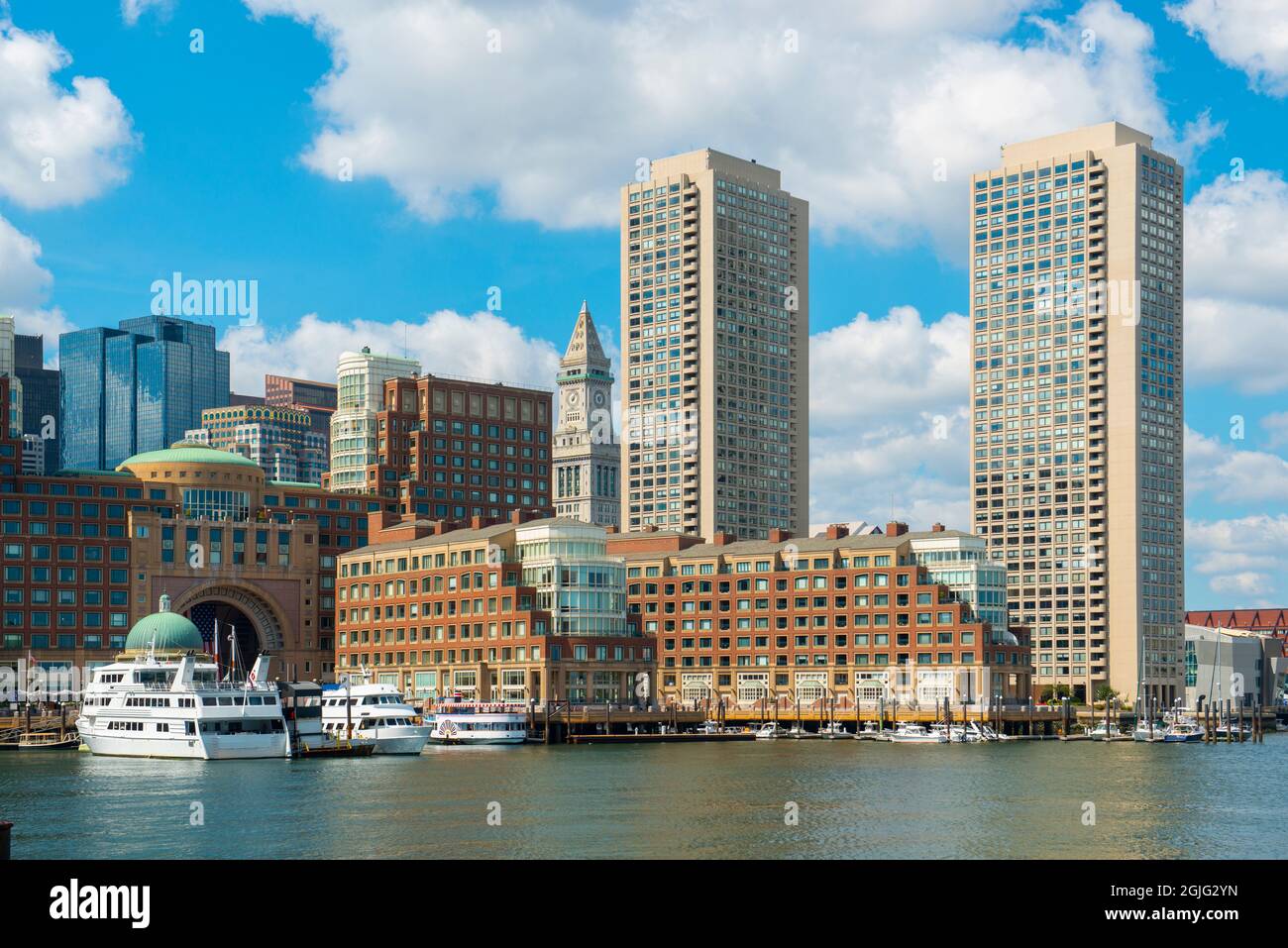Boston Harbor view including Custom House, Rowes Wharf and modern ...