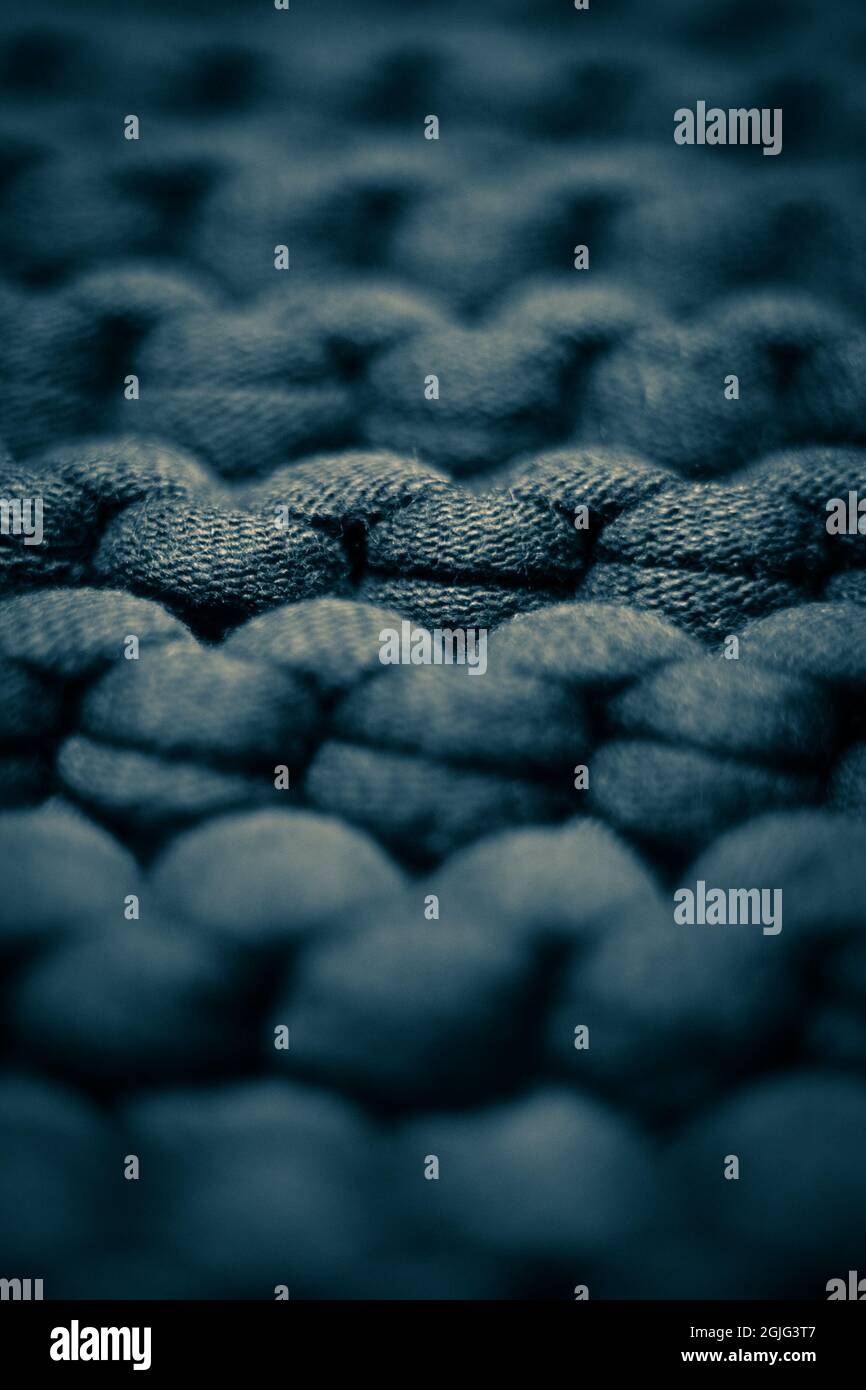 Dark blue grey background massive knitted thread pattern closeup Stock ...