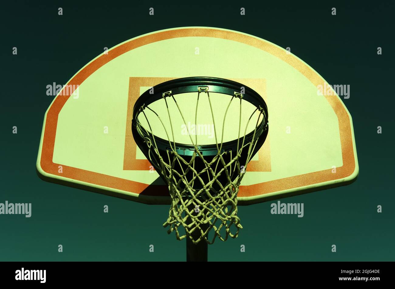 Vintage retro stylized urban basketball hoop against a blue sky Stock ...