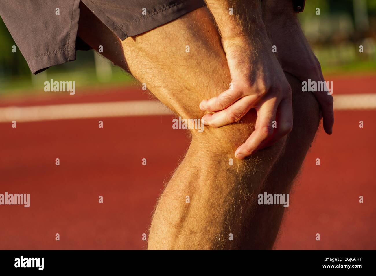 Man warm up legs on hi-res stock photography and images - Alamy