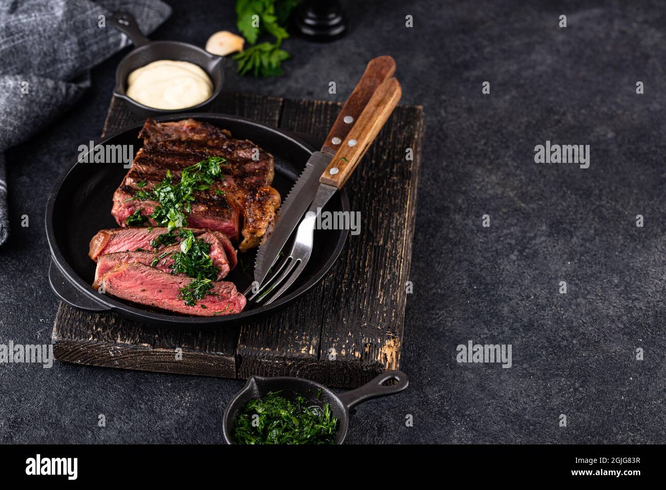 Grilled marbled rib eye steak Stock Photo - Alamy