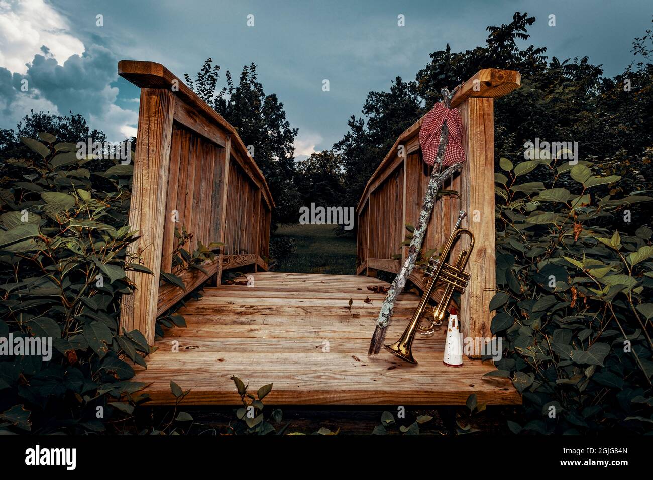 Traveling musicians trumpet and handkerchief picnic sack on a stick ...