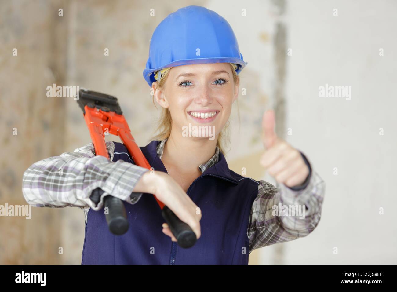 female engineer showing thumb up Stock Photo - Alamy