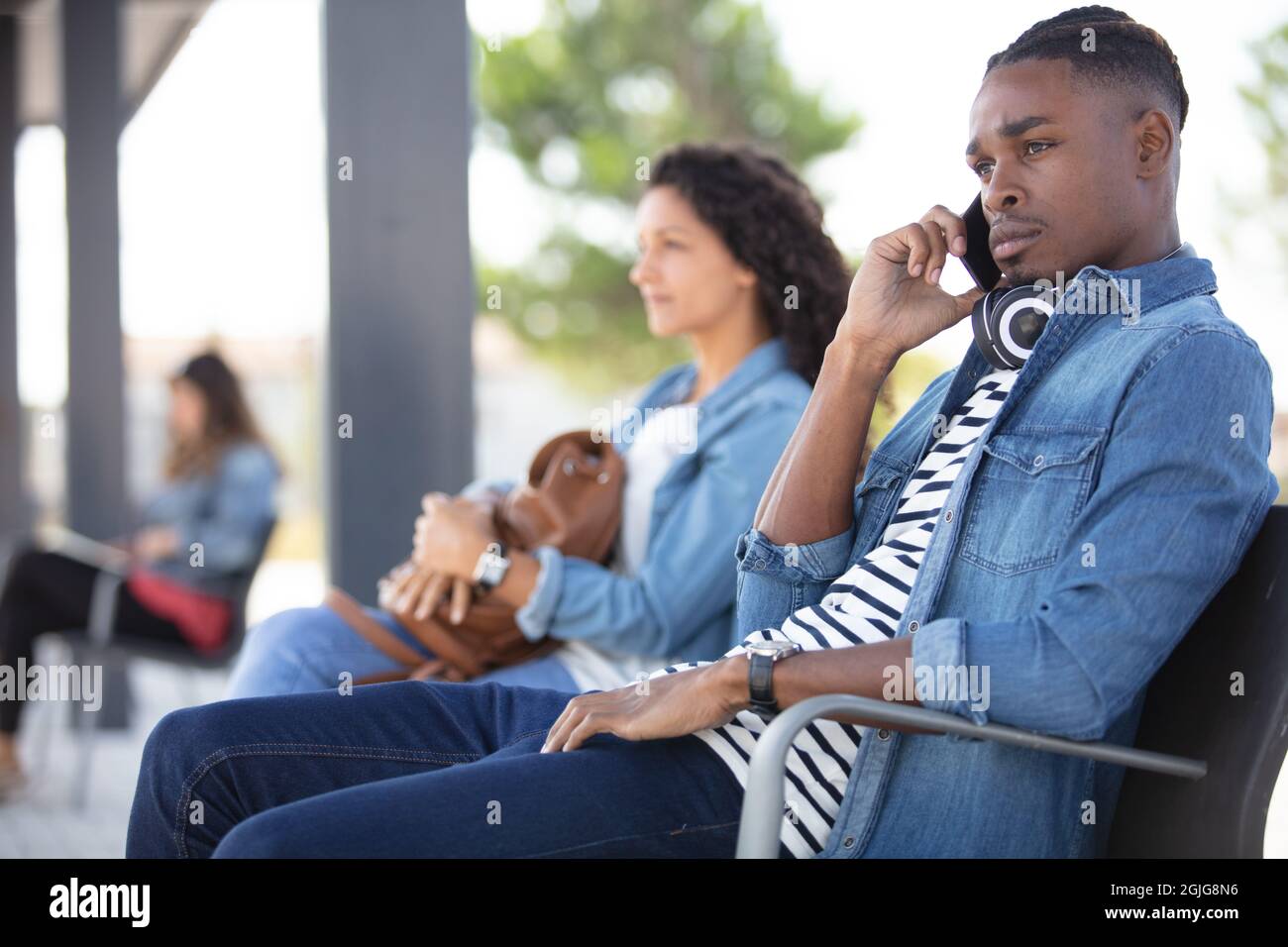 Young indian men sitting floor hi-res stock photography and images - Alamy
