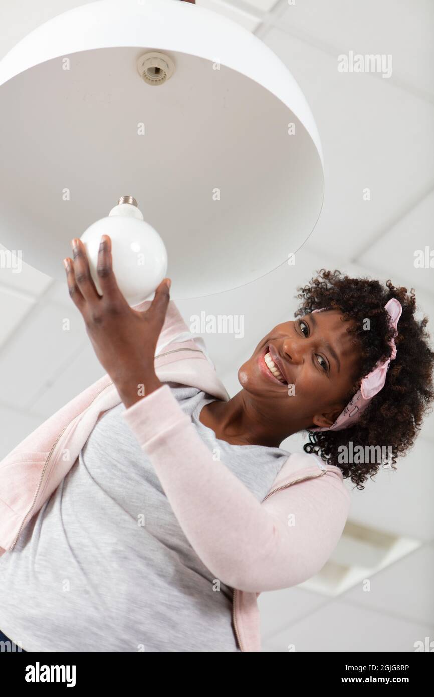 Changing a light bulb hi-res stock photography and images - Alamy