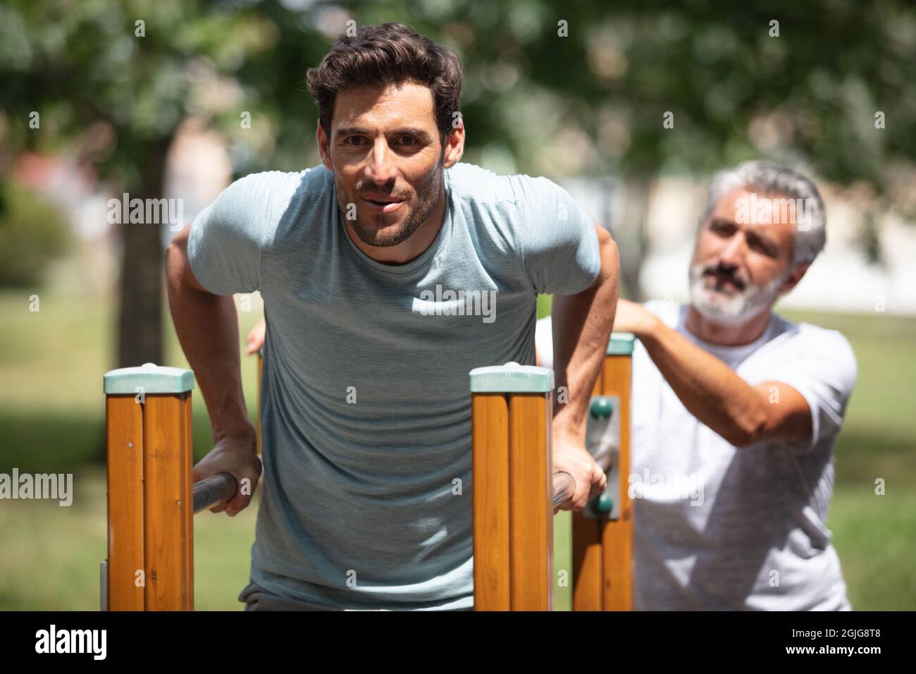 Strong young men hi-res stock photography and images - Alamy