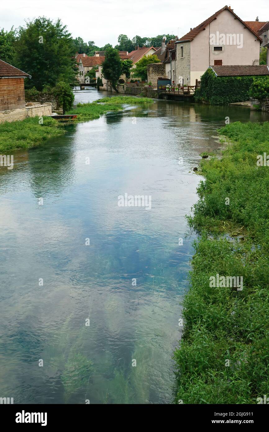 View of the river in the small ancient village of Beze in Cote D'or ...