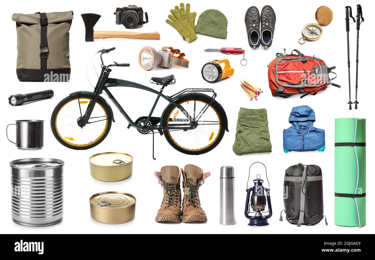 Hiking kit with bicycle on white background Stock Photo - Alamy