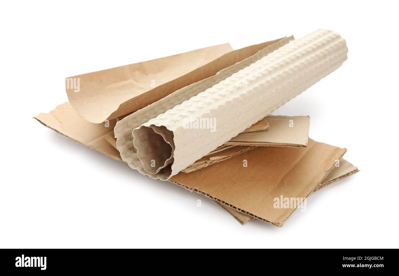 Pieces of cardboard on white background Stock Photo - Alamy