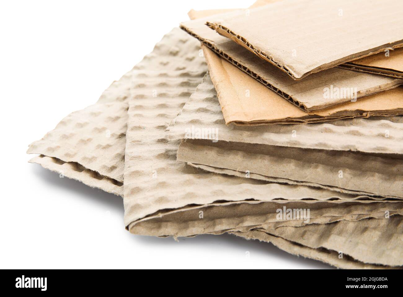 Pieces of cardboard on white background Stock Photo - Alamy